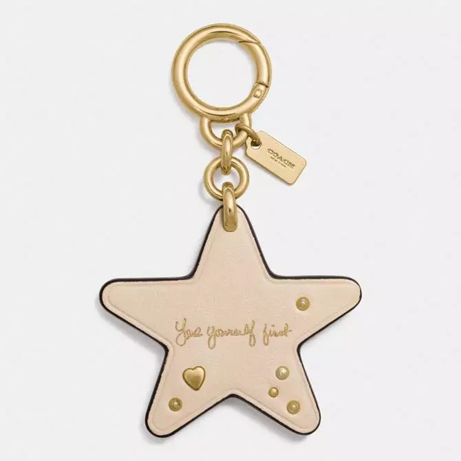 selena gomez ẹlẹsin apo rẹwa keychain