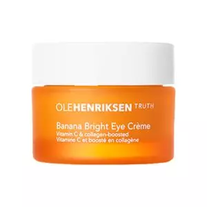 OLEHENRIKSEN ബനാന ബ്രൈറ്റ് ഐ ക്രീമിന്റെ ഓറഞ്ച് ഭരണി