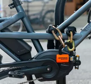Lacăt de bicicletă cu kriptonit blocat portocaliu