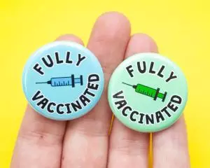 πλήρως εμβολιασμένα κουμπιά, εμπορεύματα εμβολίων κατά του Covid