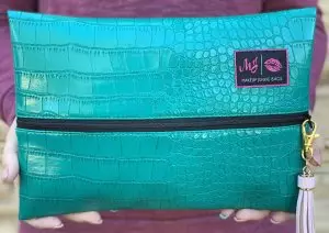 Make-up junkie tassen turquoise alligator, zoals te zien op haaientank