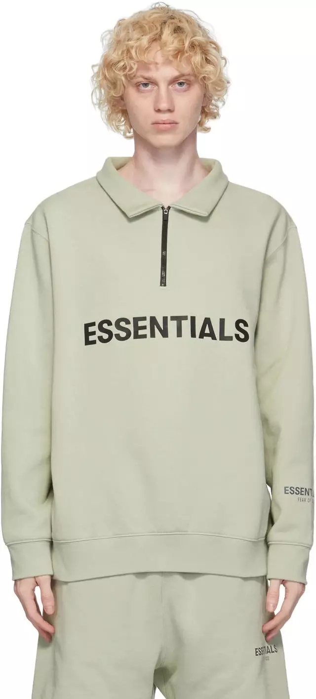 Mock Neck Sweater LA-bazita Essentials miksas stratvestajn stilojn kun dezajnista tuŝo. La rezulto estas markitaj vestaĵoj, kiuj ne aspektas aŭ sentas kiel emblema vestaĵo. Ilia mokkola ŝvitĉemizo havas ĉion, kion vi volas en unu. Tiu trankviliga sento esti envolvita en kotono, kiu estas palpa kaj plaĉa. Ilia imita kolo facile transformas en V-kolo. Ĝi estas iomete trogranda kaj havas ripajn manumojn.