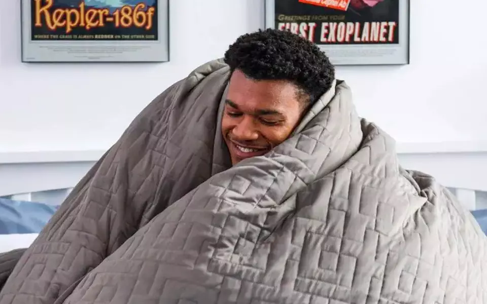 man-under-gravity-blanket